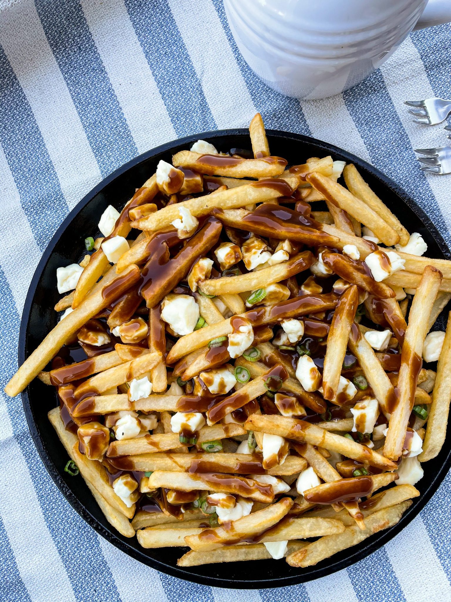 Easy Poutine | A Canadian Dish of French Fries, Cheese Curds, and Gravy